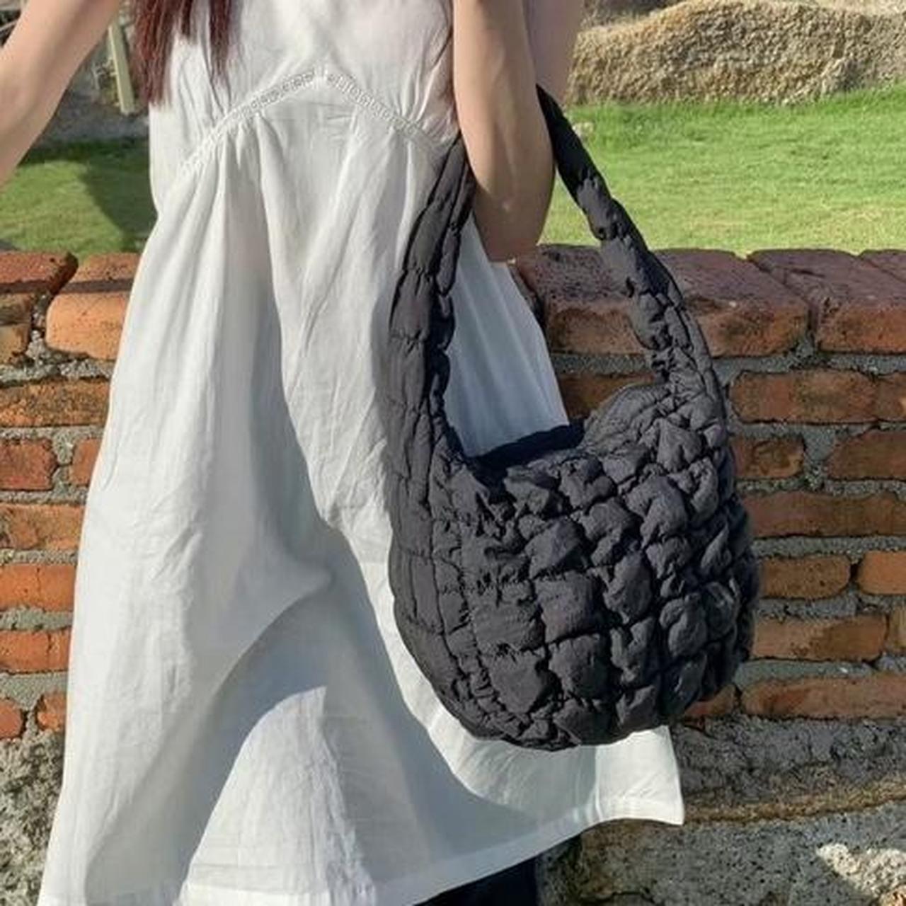 Small black quilted shoulder bag #quilted #cos #puffer - Depop