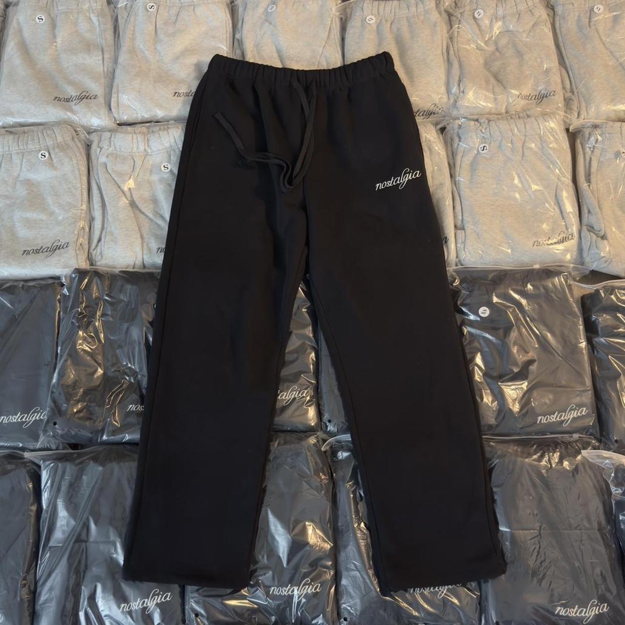 nostalgia sweat pants black- size M ( fits large... - Depop