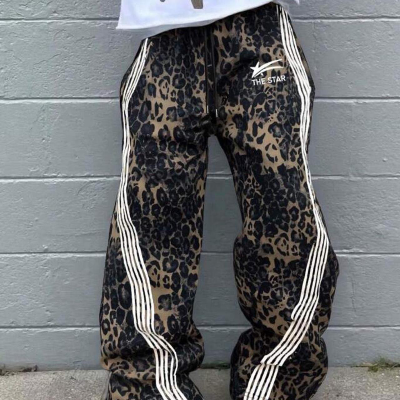 Brown and black leopard print sweatpants with white... | Depop