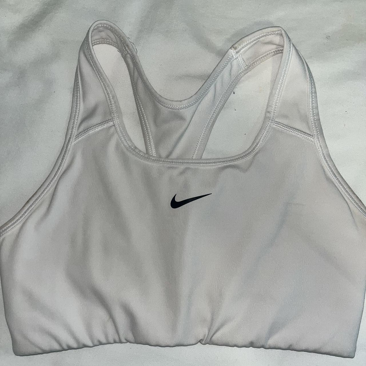 White Nike sports bra. Women’s size small. Lightly... - Depop