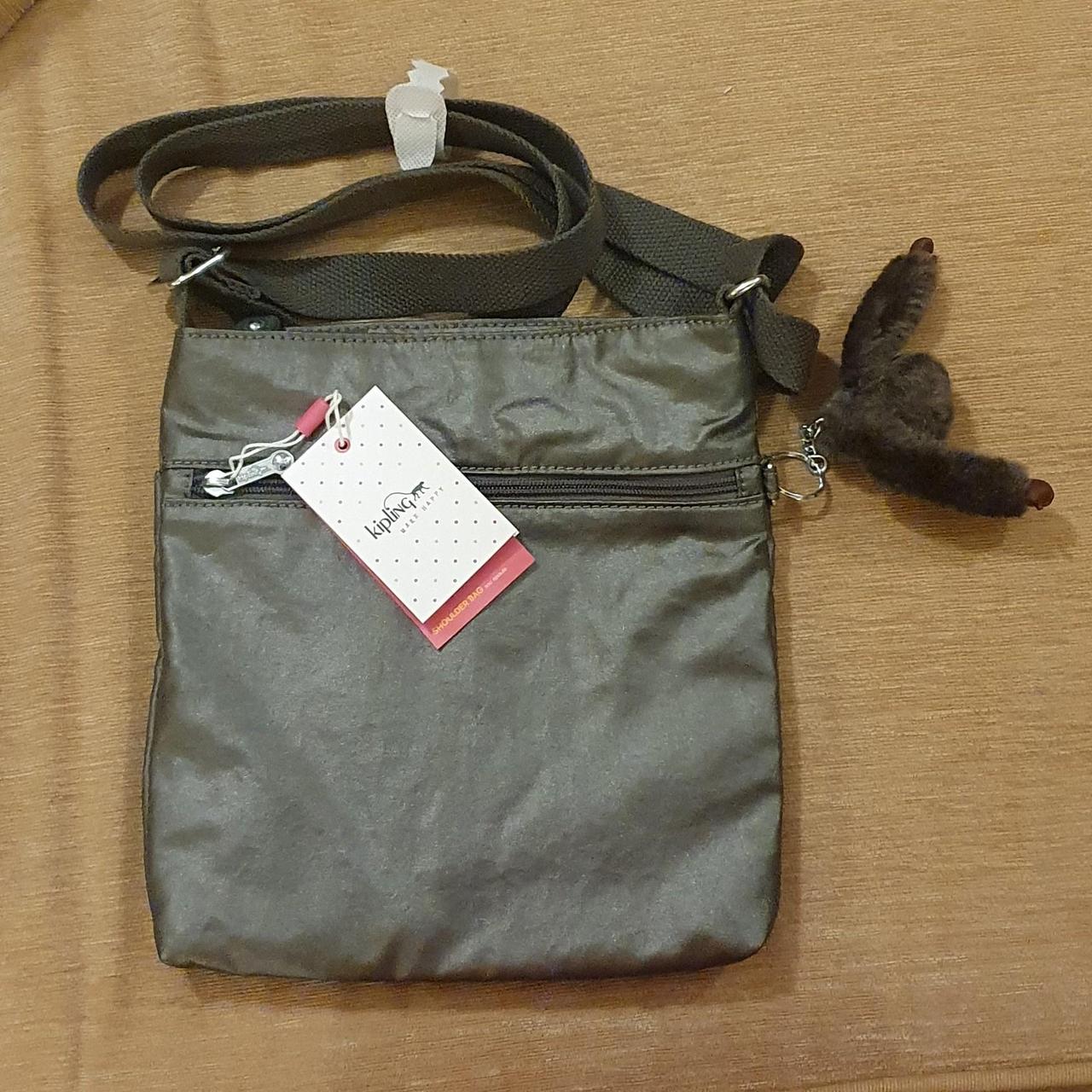 Grey/ silver Kipling crossbody bag with monkey key... - Depop