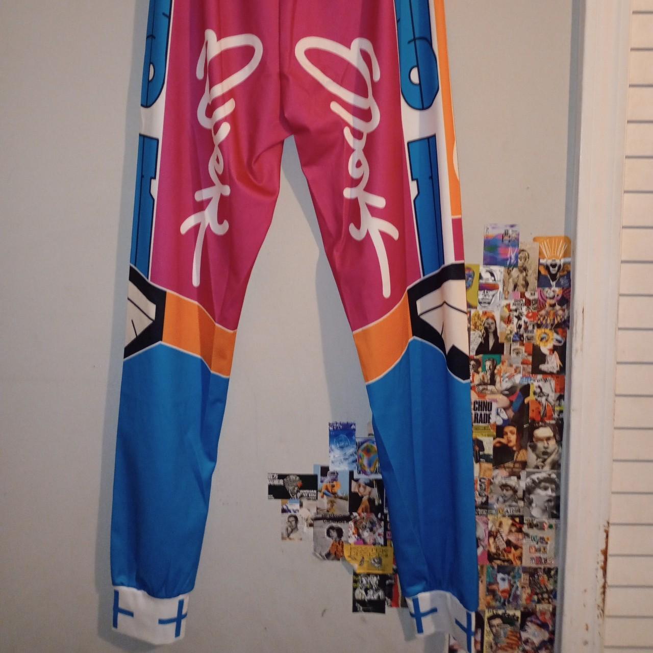 Light weight race car like pink graphic pants Will... - Depop