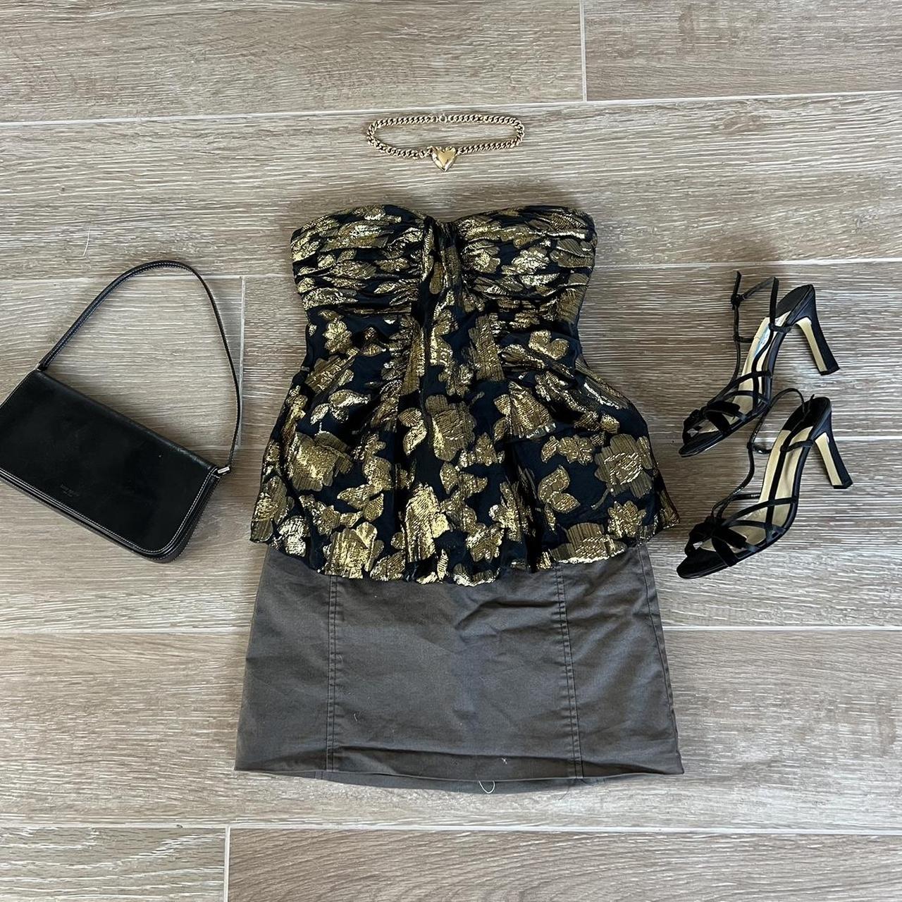 black and gold bebe tube top size S/M good condition... - Depop