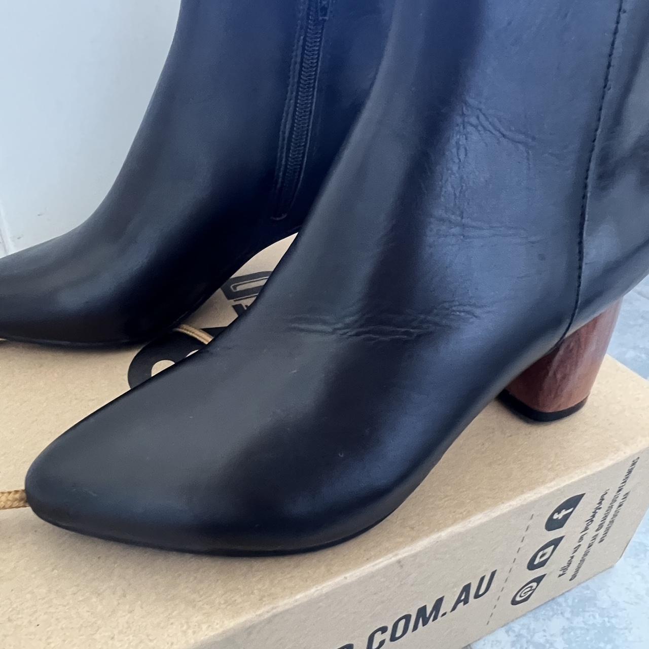 Bared Firecrest Ankle Boots in Black Leather/Wood.... - Depop