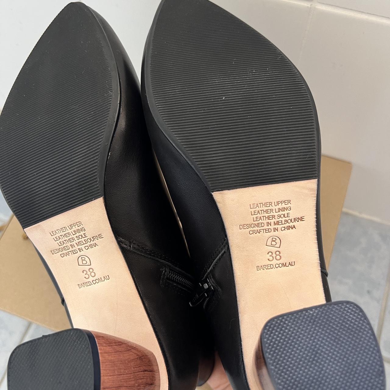 Bared Firecrest Ankle Boots in Black Leather/Wood.... - Depop