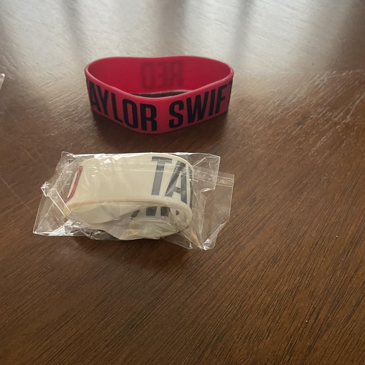 Taylor Swift light up stick and two bracelet bands.... | Depop