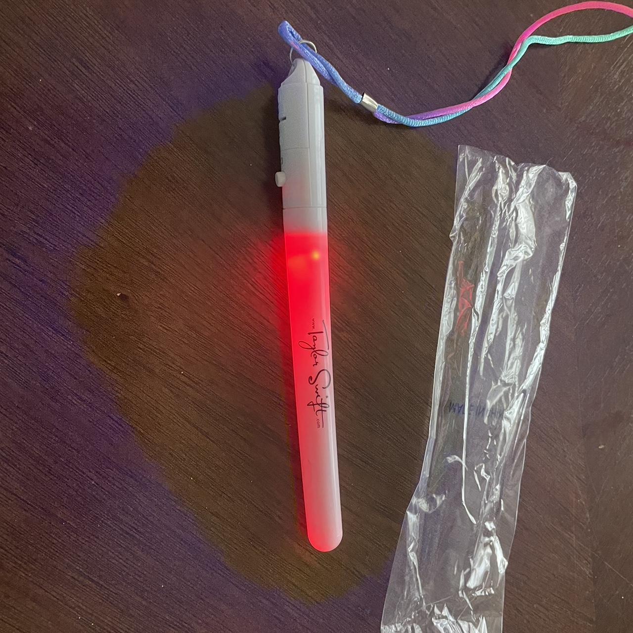 Taylor Swift light up stick and two bracelet bands.... | Depop