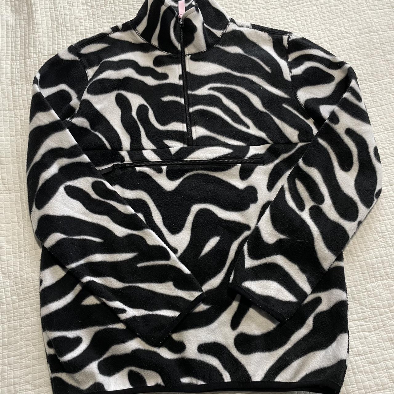 Medium zebra print quarter zip up Could also fit... - Depop
