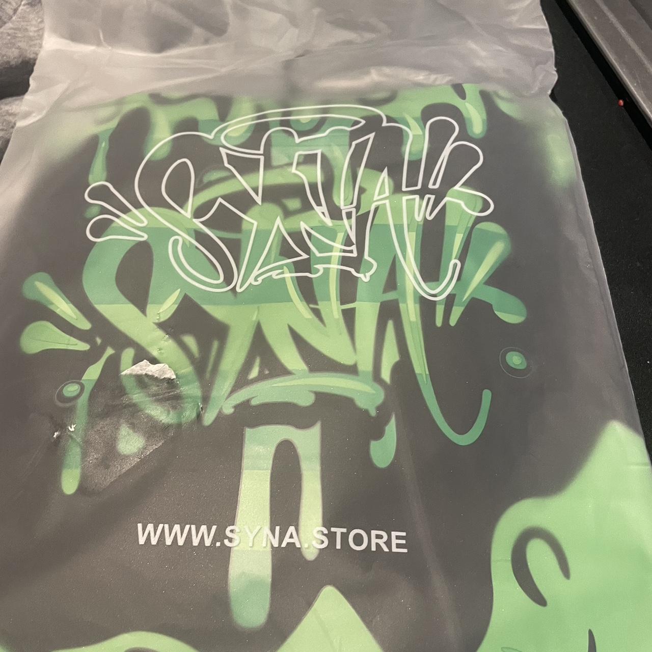 syna world beanie brand new w tags and keychain... - Depop