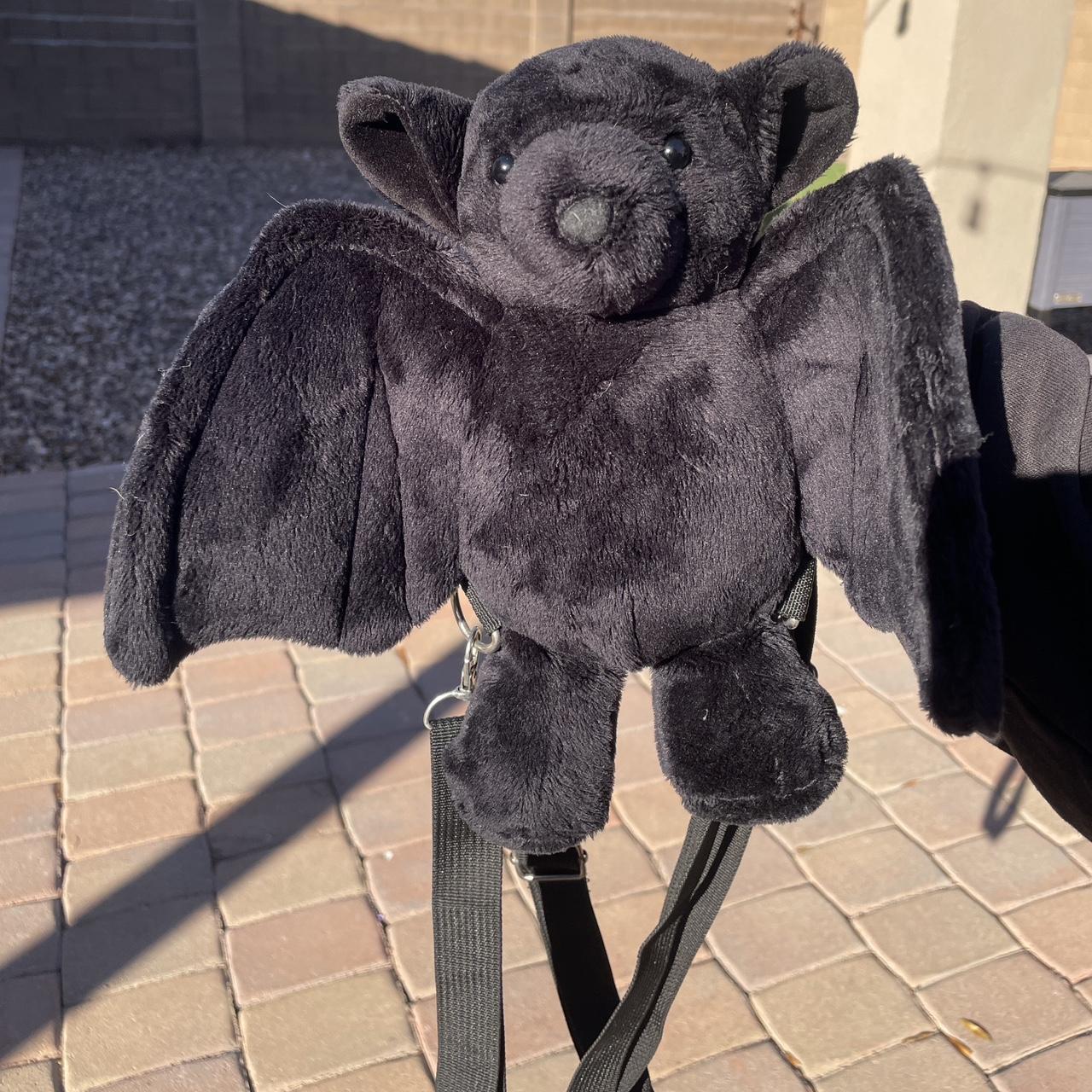 Black bat backpack with back zipper, brand is widow. - Depop