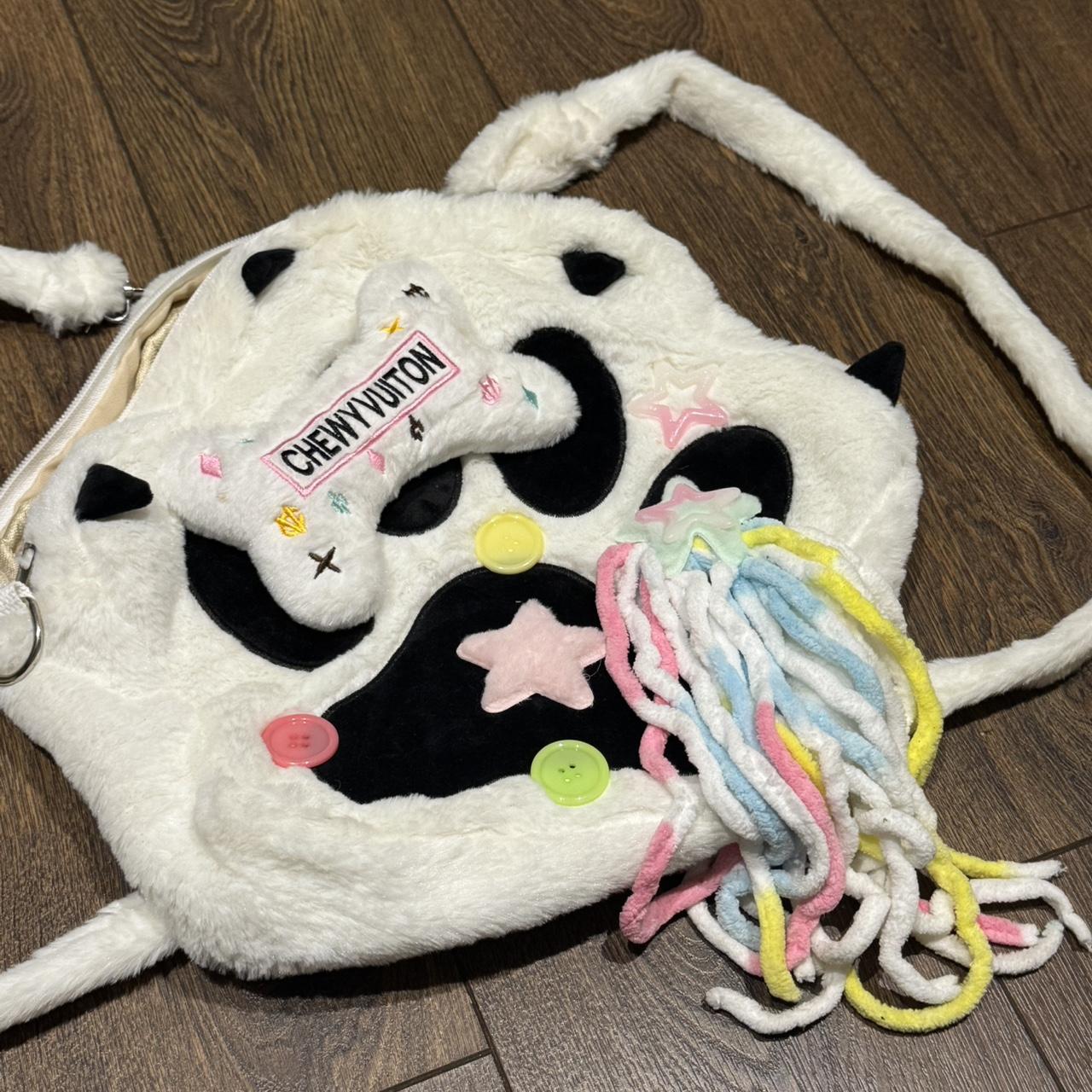 Cute white and black paw shape backpack only wore... - Depop