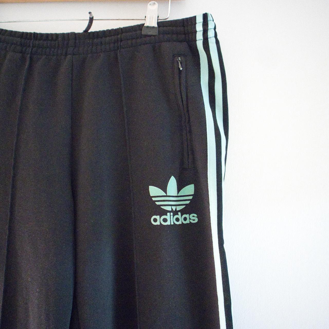 Comfy Adidas Trackies Showcase your laid-back style... - Depop
