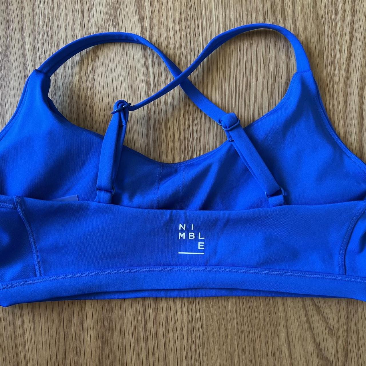 Blue sports bra from Nimble. Brand new with tags,... - Depop