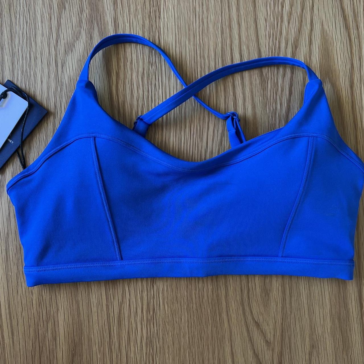 Blue sports bra from Nimble. Brand new with tags,... - Depop