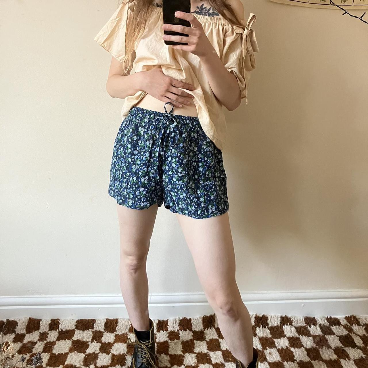 Cutest floral baggy fit mini shorts in blue. The... - Depop