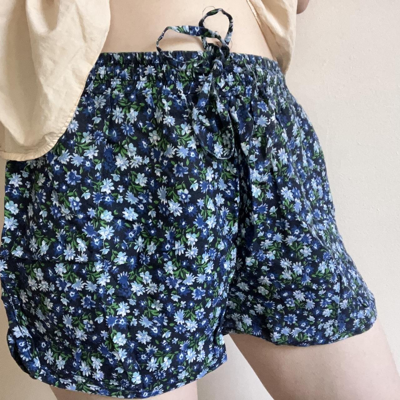 Cutest floral baggy fit mini shorts in blue. The... - Depop