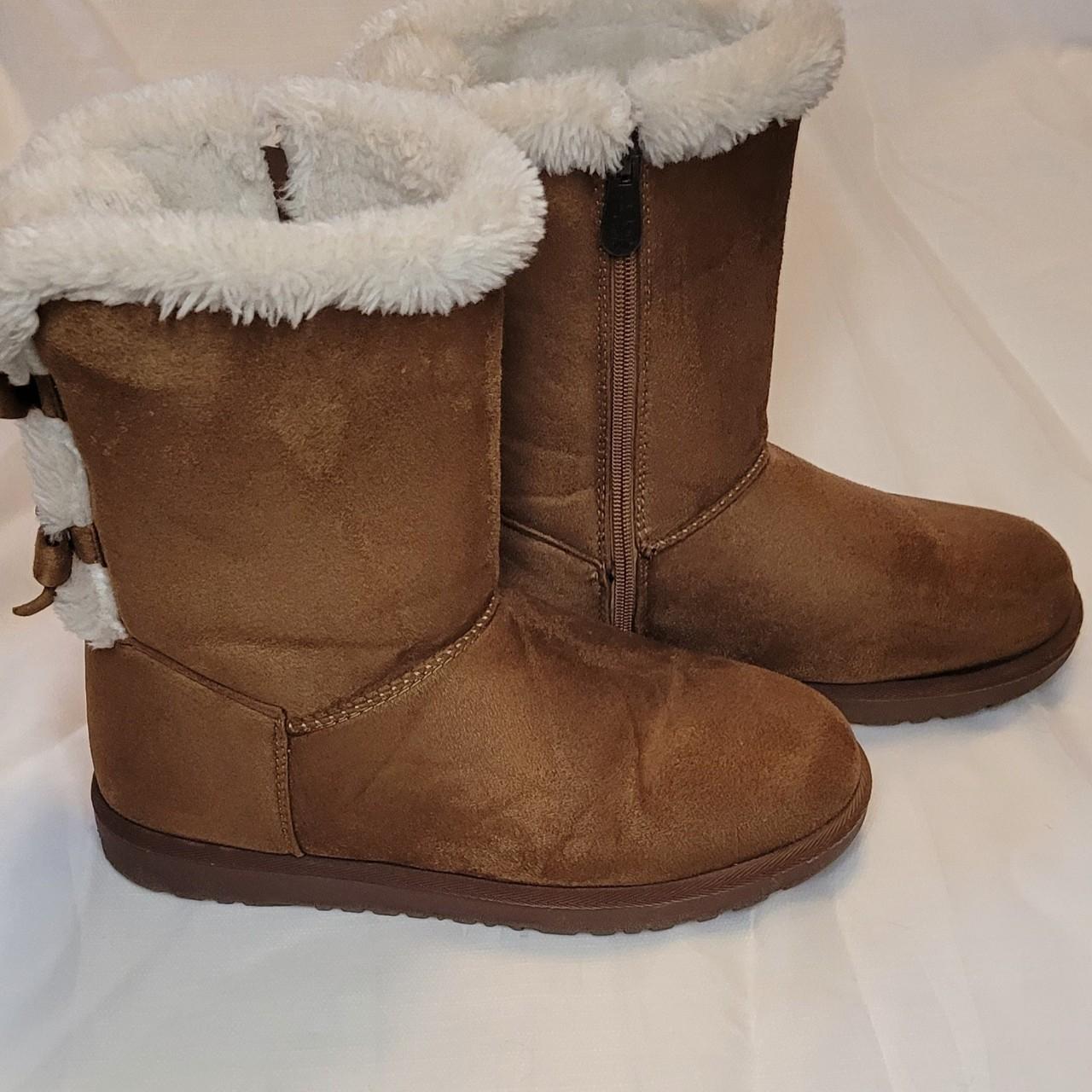 Fuzzy ugg type boots with bows. Gently worn a couple... - Depop