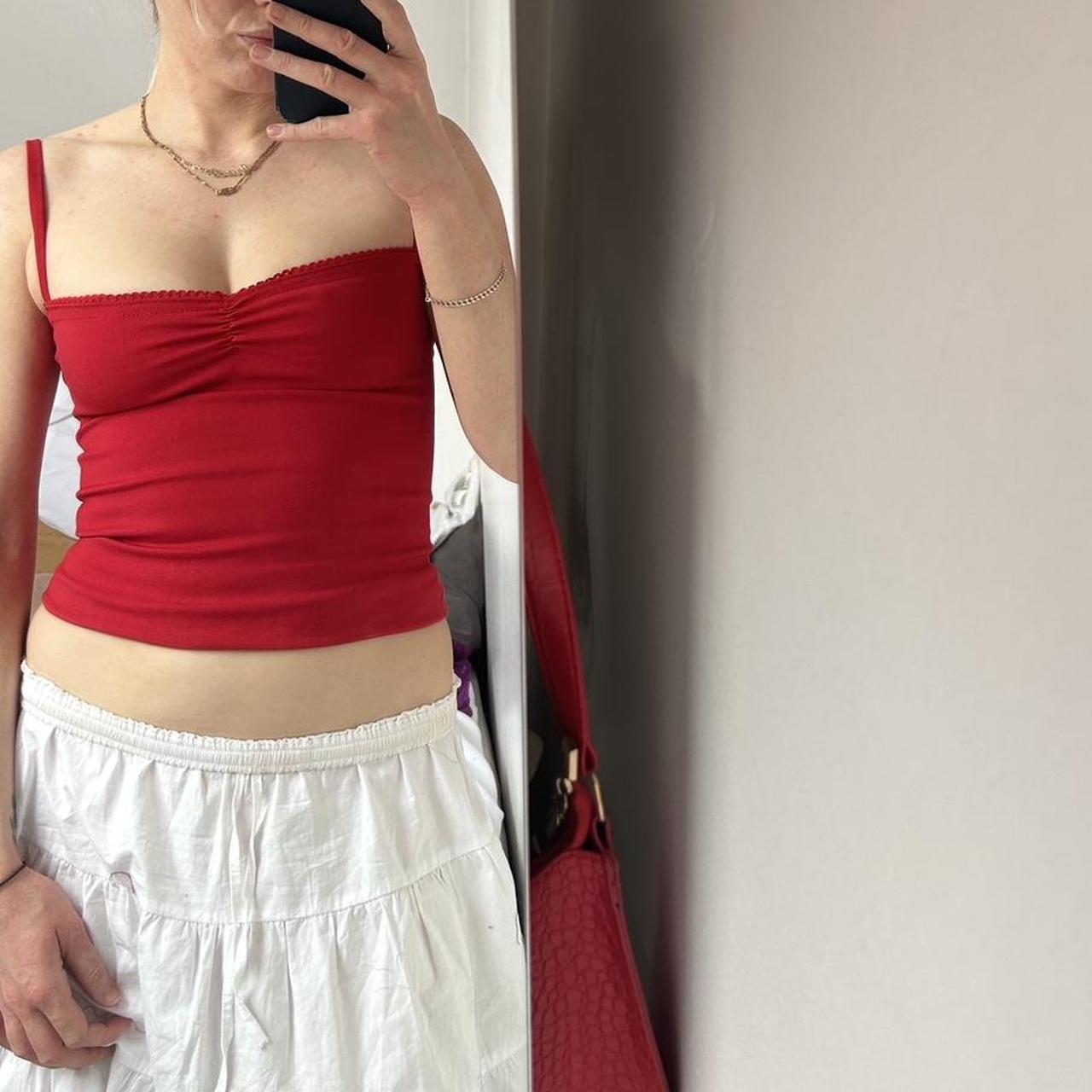 Red corset style cami top with red lace trim... - Depop