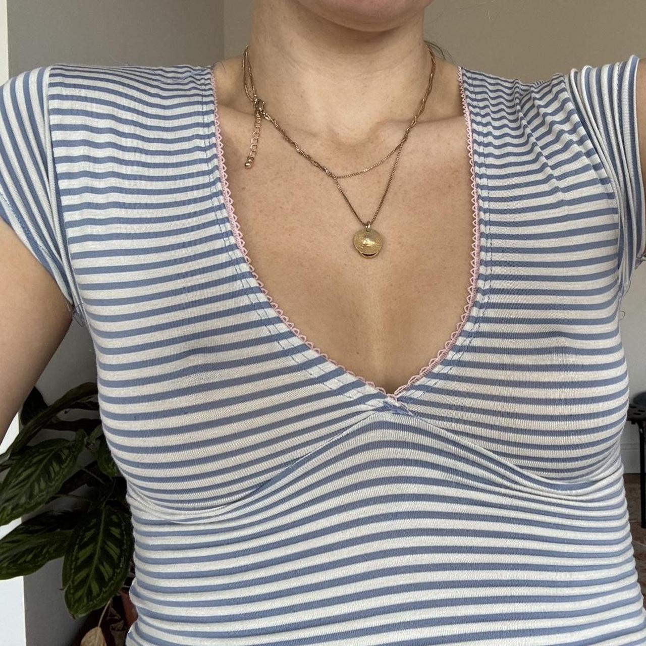 Blue and white stripe cross over top With pink trim... | Depop