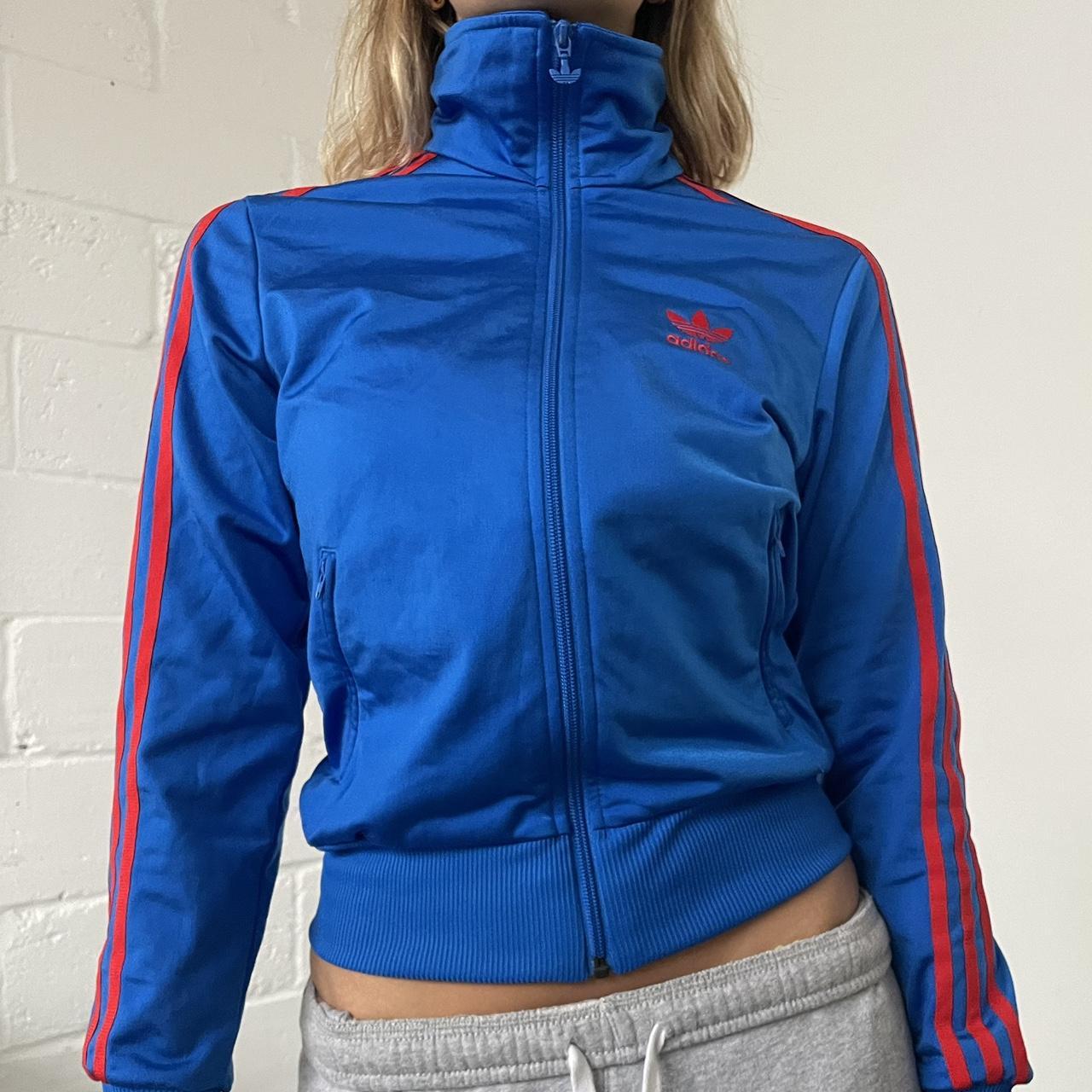 Bright blue adidas zip up jacket. Red stripes.... - Depop