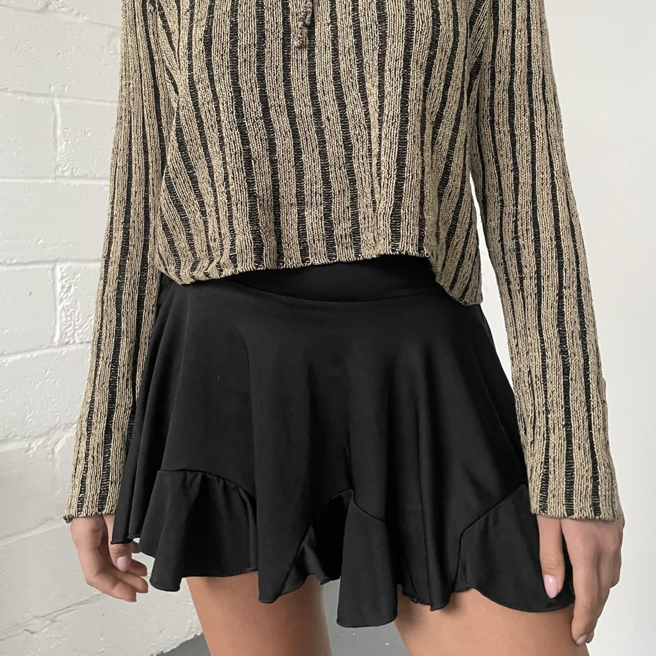 Black ruffled skirt skort. Slinky, stretchy black... - Depop