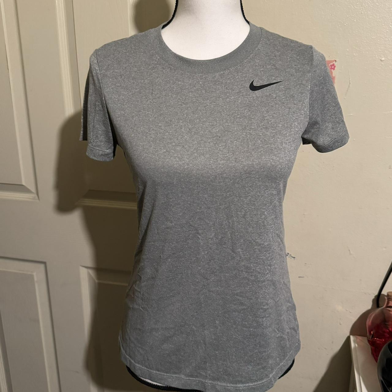 Nike grey dri fit shirt. Labeled a XS. - Depop