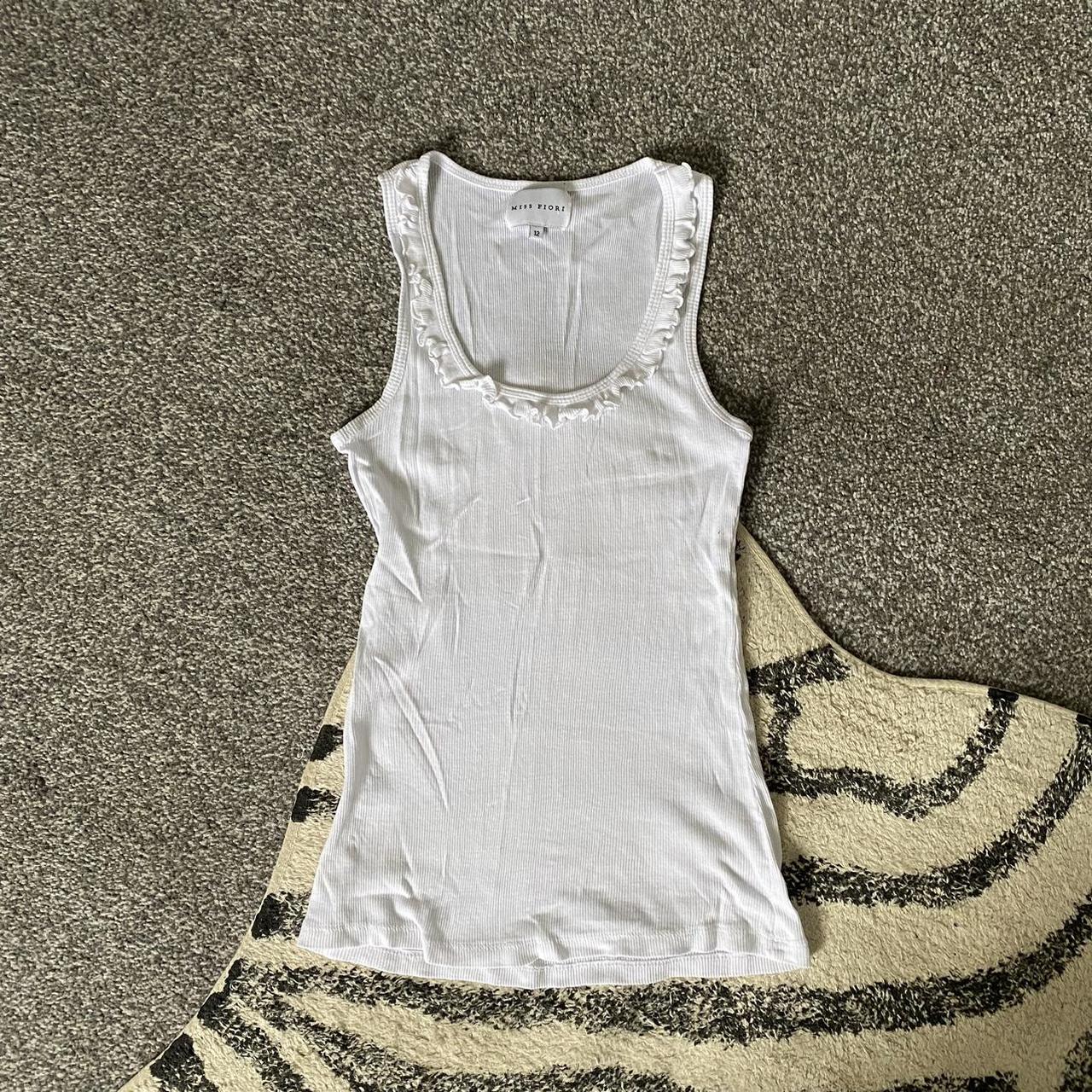 Frilly white ribbed vest top - Depop
