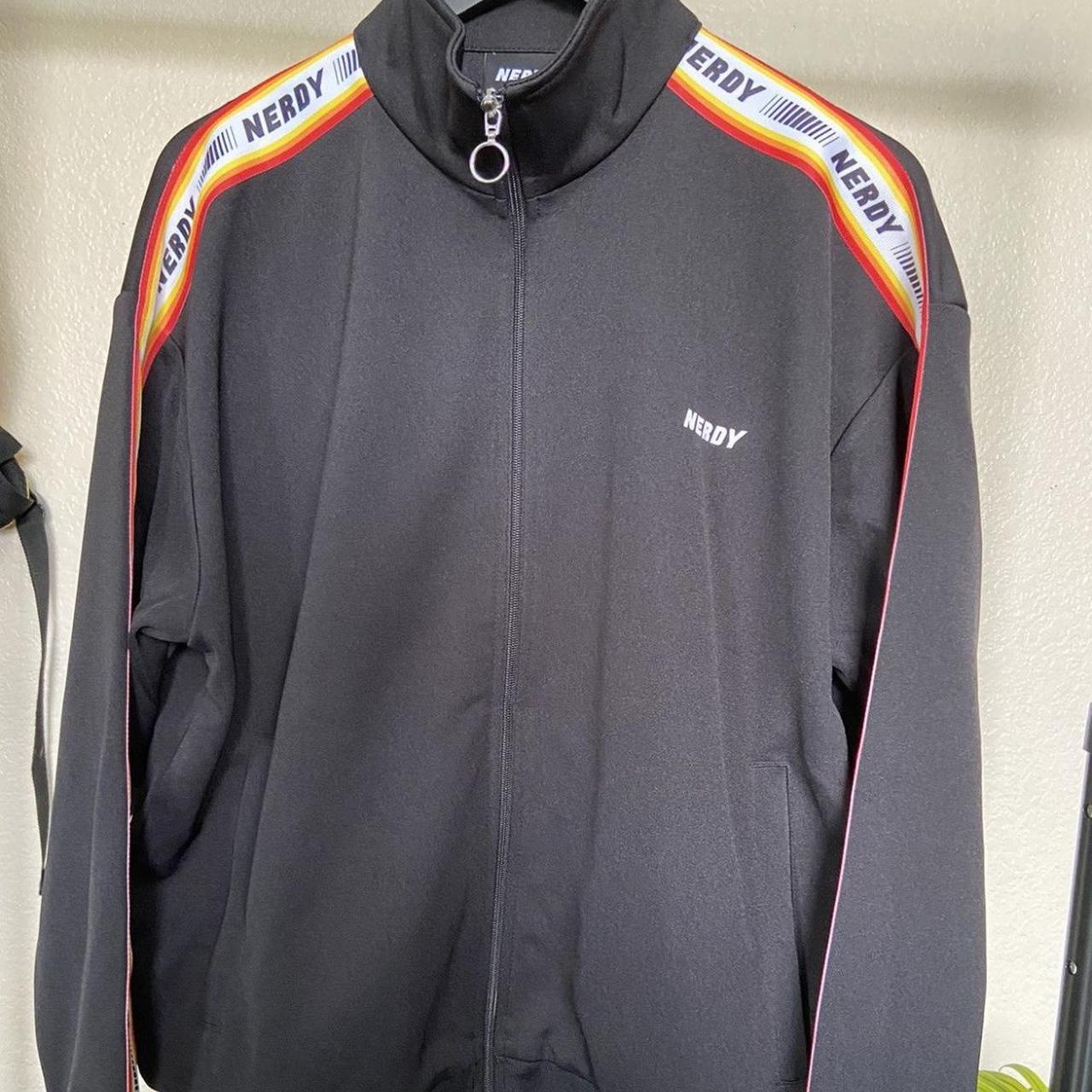 Nerdy black and orange zip-up track jacket Fits true... - Depop