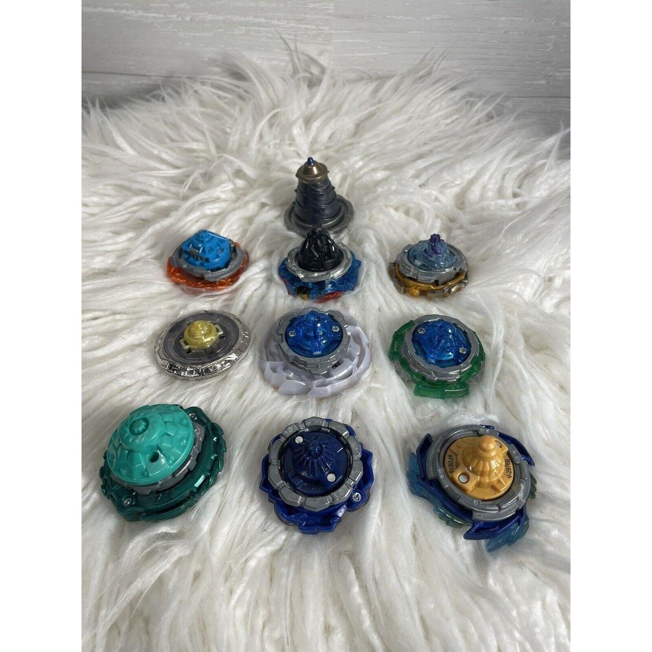 Beyblade lot of 10 beyblades and 2 rippers. Great... - Depop