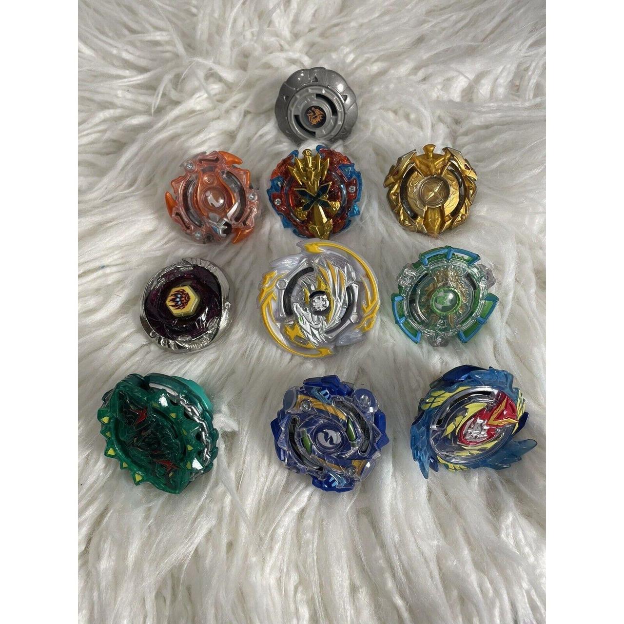 Beyblade lot of 10 beyblades and 2 rippers. Great... - Depop