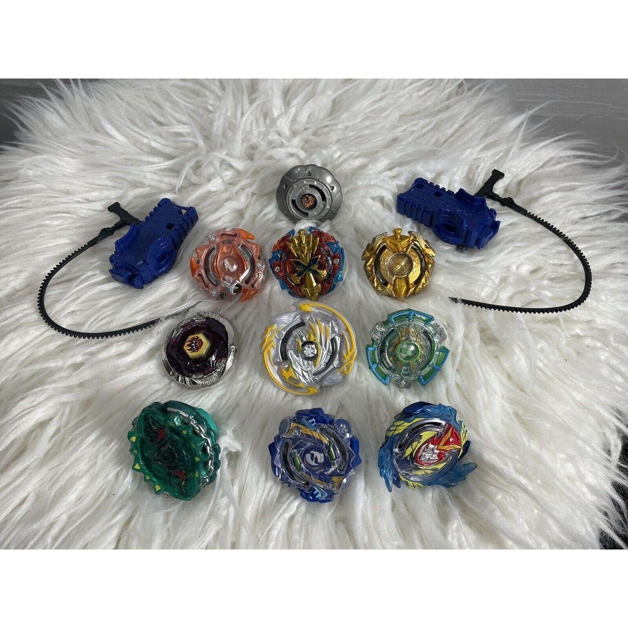 Beyblade lot of 10 beyblades and 2 rippers. Great... - Depop