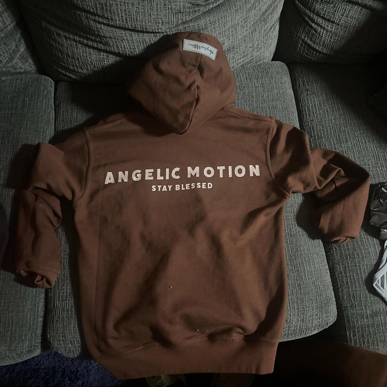 Angelic Motion hoodie - Depop