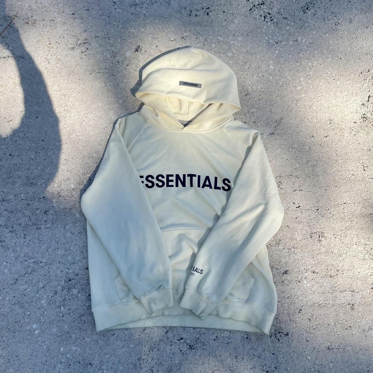 Essentials cream and black hoodie -Size... - Depop