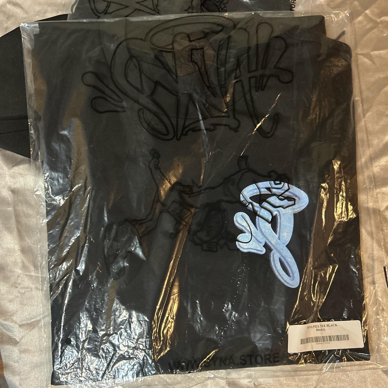 Large Black Syna Pill Tee Unopened - Depop