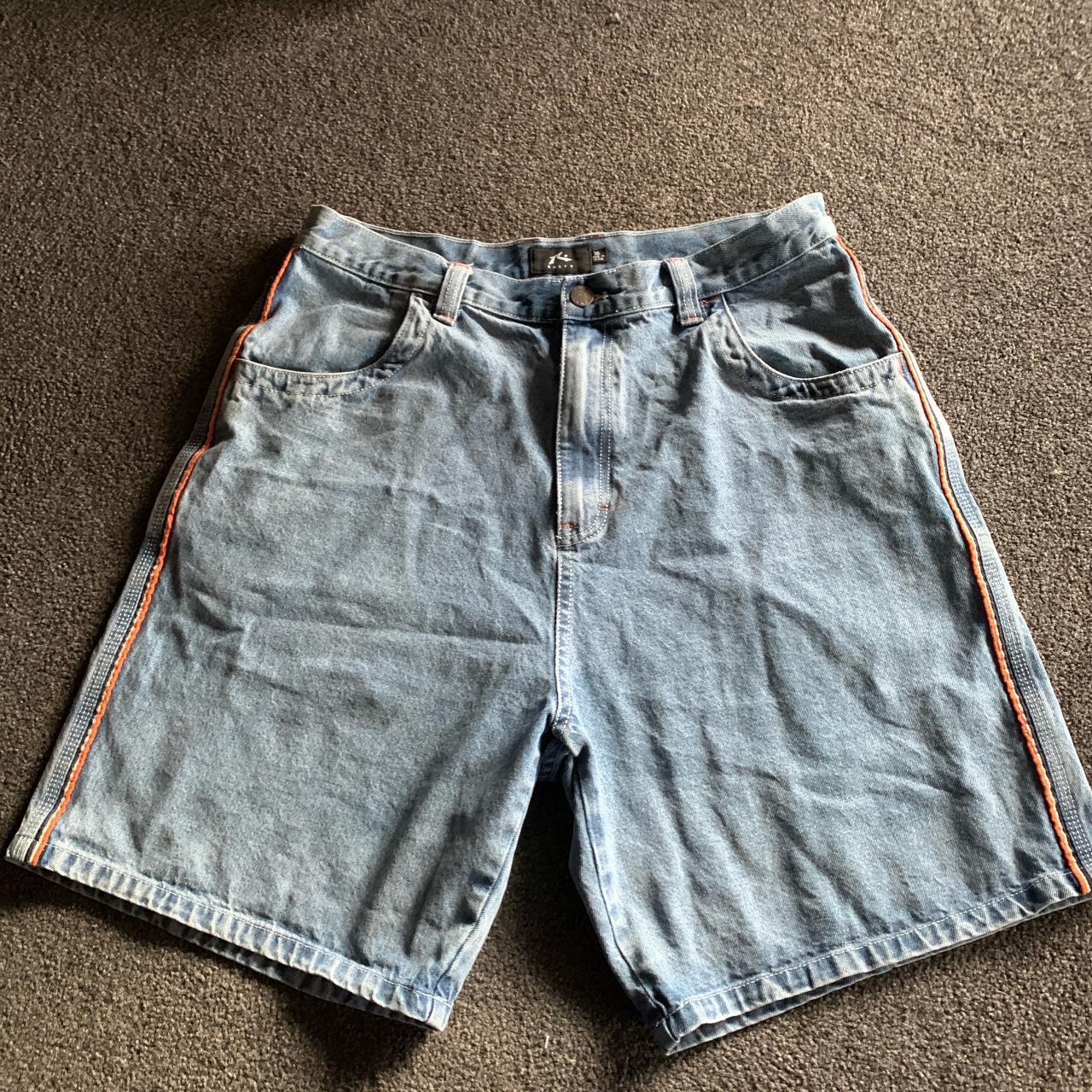 Baggy mid wash rusty vintage style jorts Sick as... - Depop