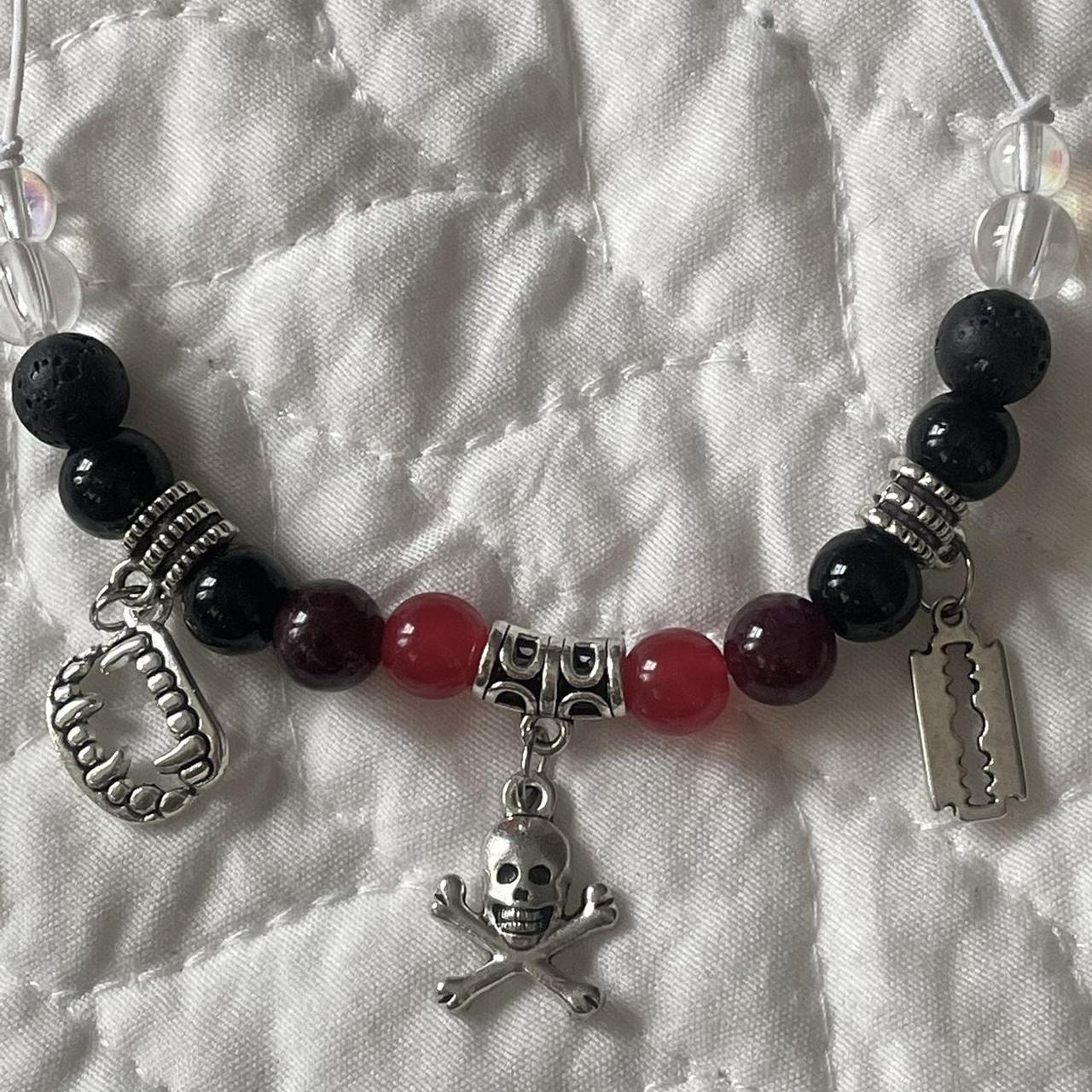 ੈ ‧₊ red and black emo charm bracelet, could be... - Depop