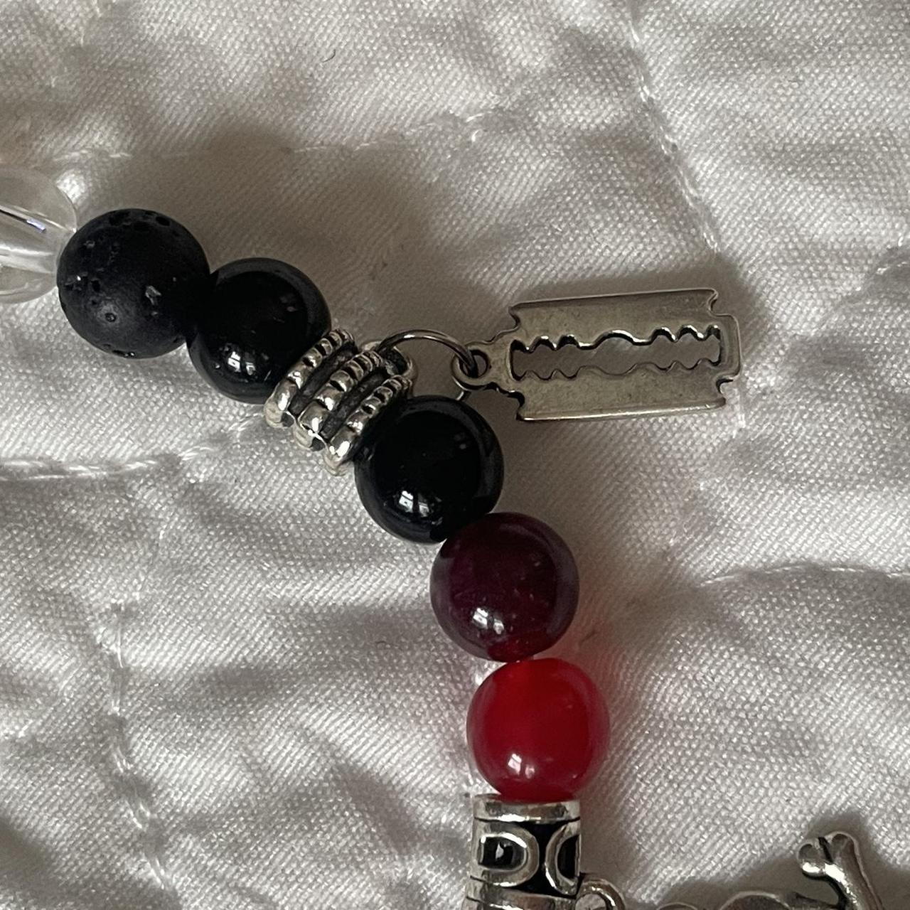 ੈ ‧₊ red and black emo charm bracelet, could be... - Depop