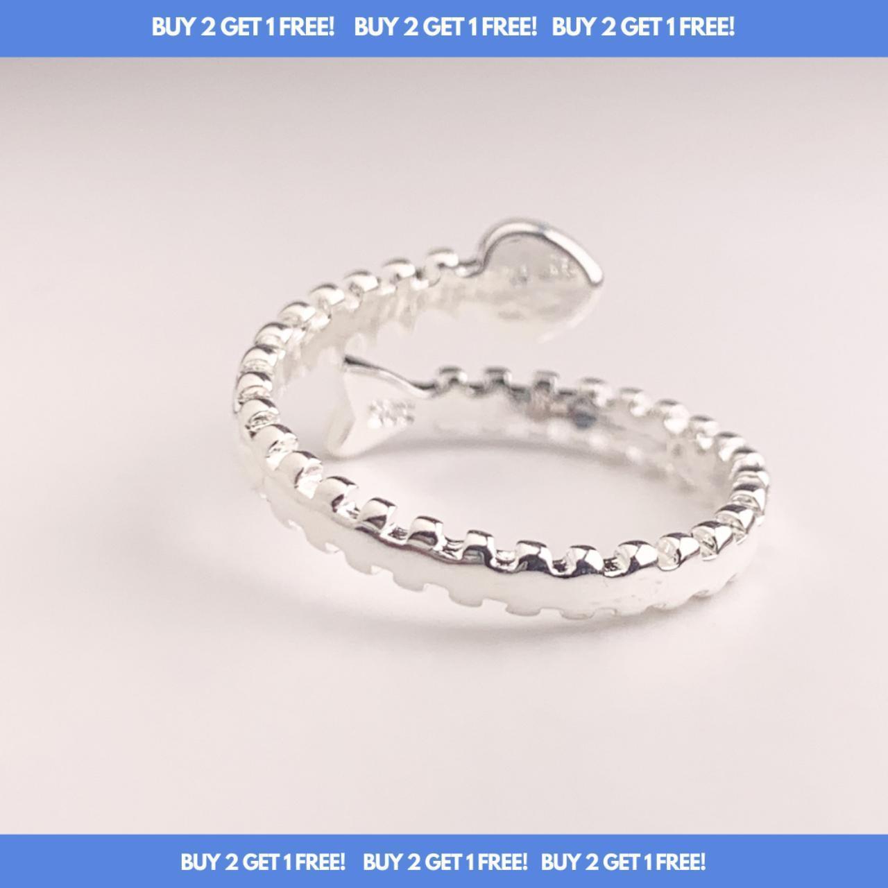 Silver Fish ring Is adjustable to fit any finger... - Depop