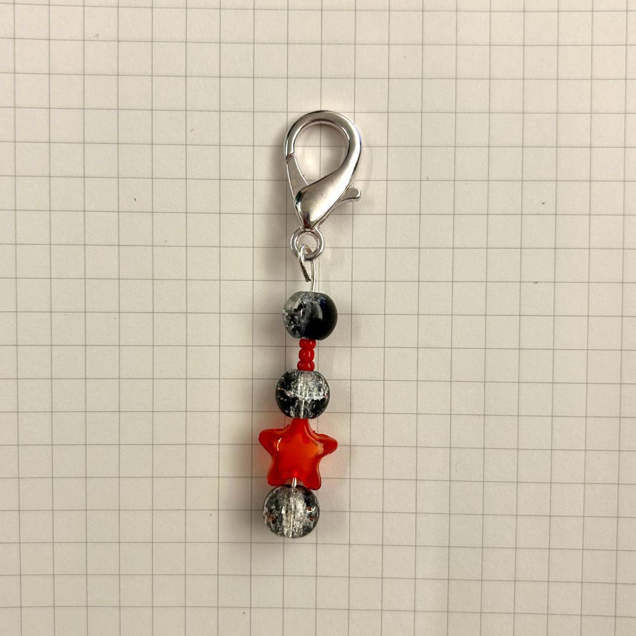 red and black beaded keychain, 1.5" long, silver - Depop
