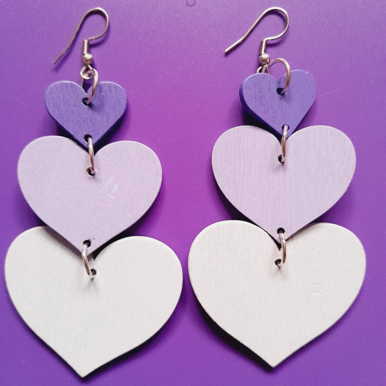Very large wooden heart design long dangle earrings.... - Depop