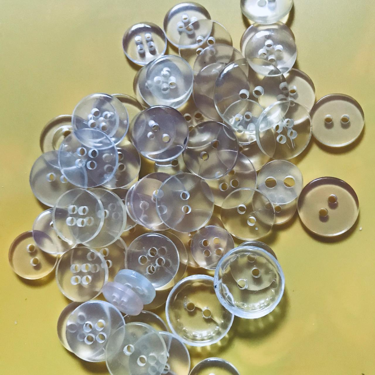 40 round transparent buttons. - Depop