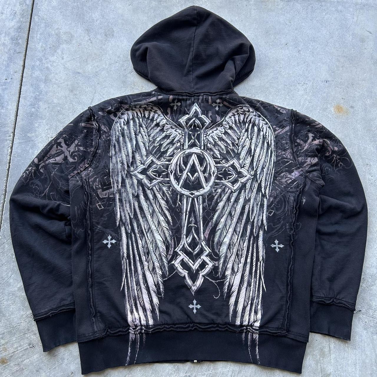 Affliction black and white zip-up hoodie with cross... - Depop