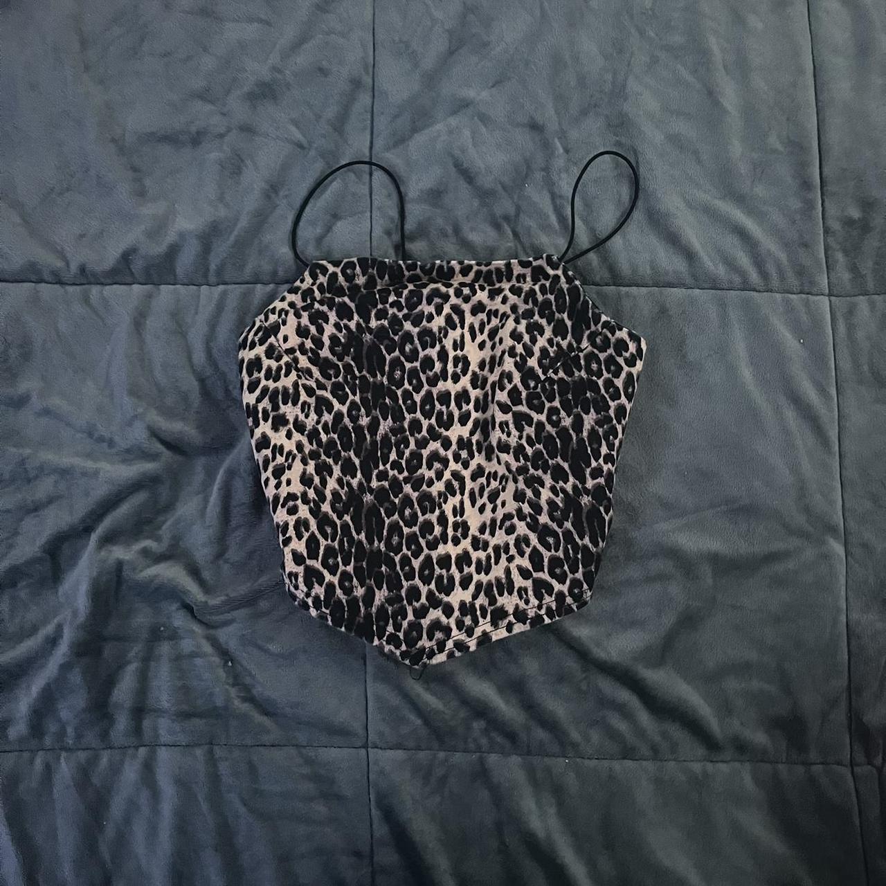 ୨♡୧┈┈•༶ "street code" cheetah print crop top... - Depop