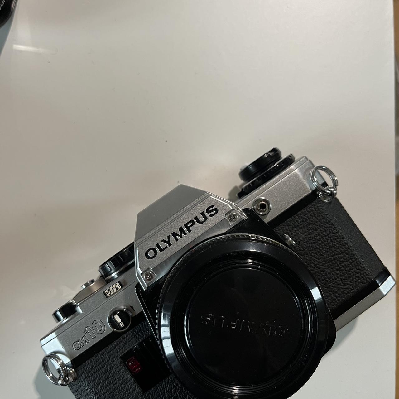 VINTAGE WORKING Olympus camera OM10 - lens sold... - Depop