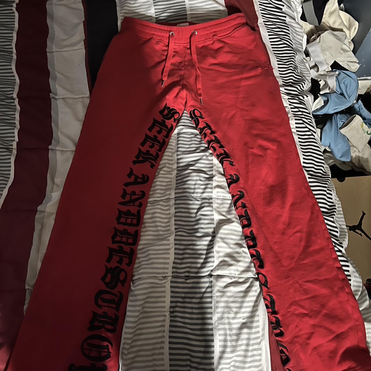 Red Stacked Sweat pants Size M-32 - Depop