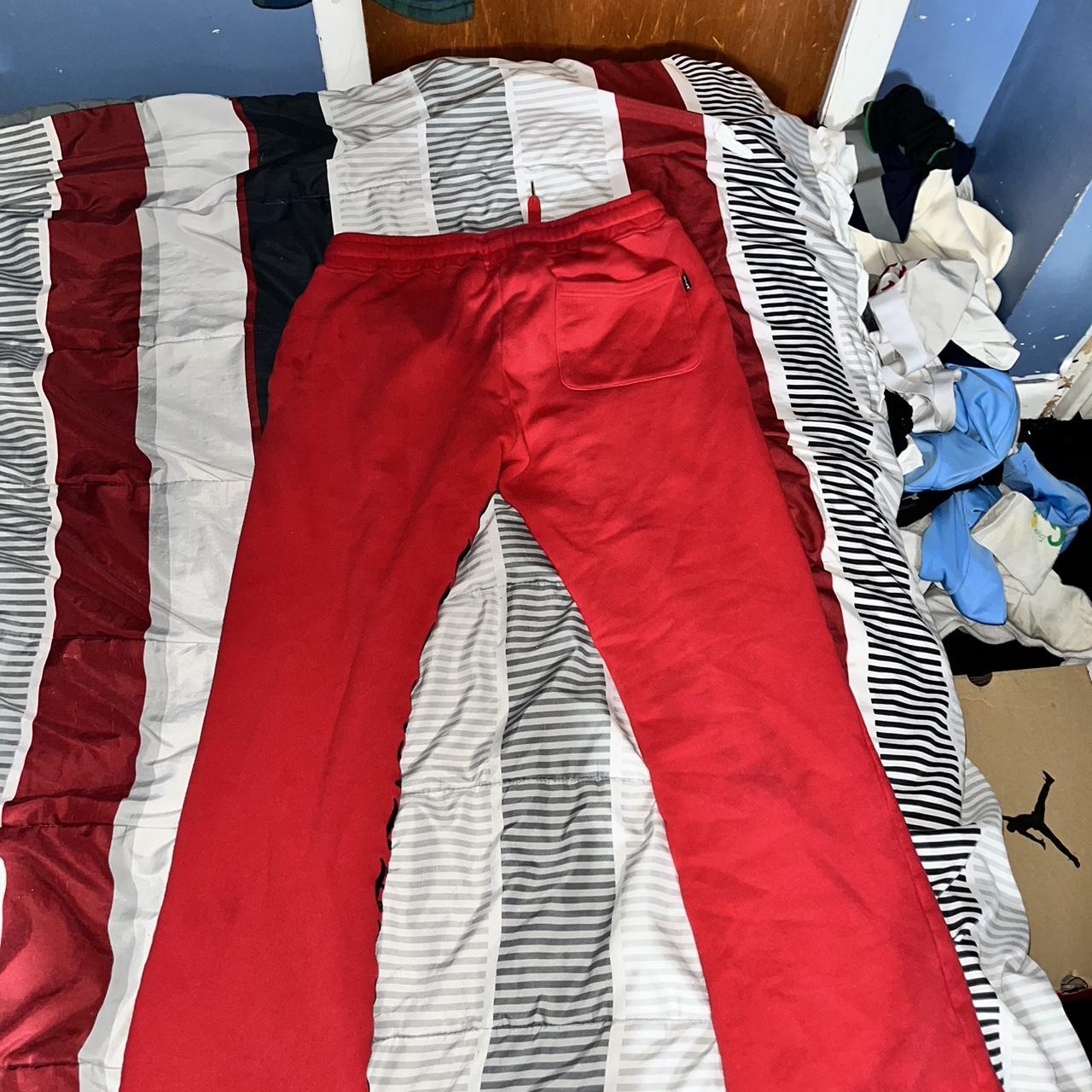 Red Stacked Sweat pants Size M-32 - Depop