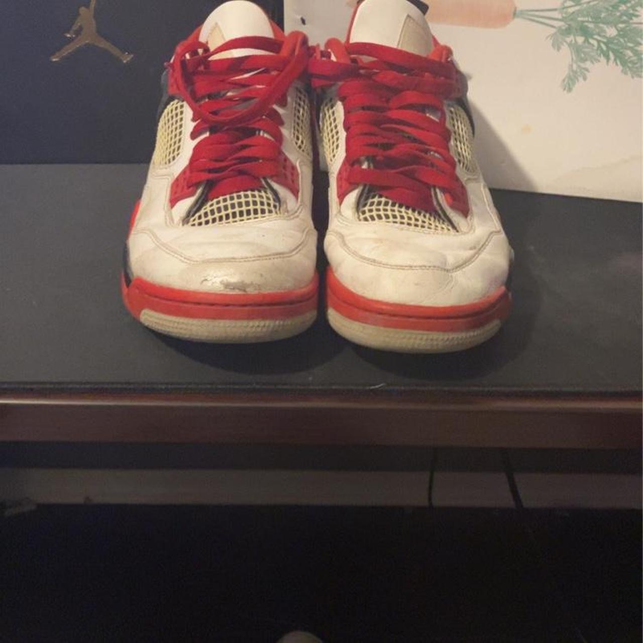 Size 10 Jordan 4 fire reds no box really used not... - Depop