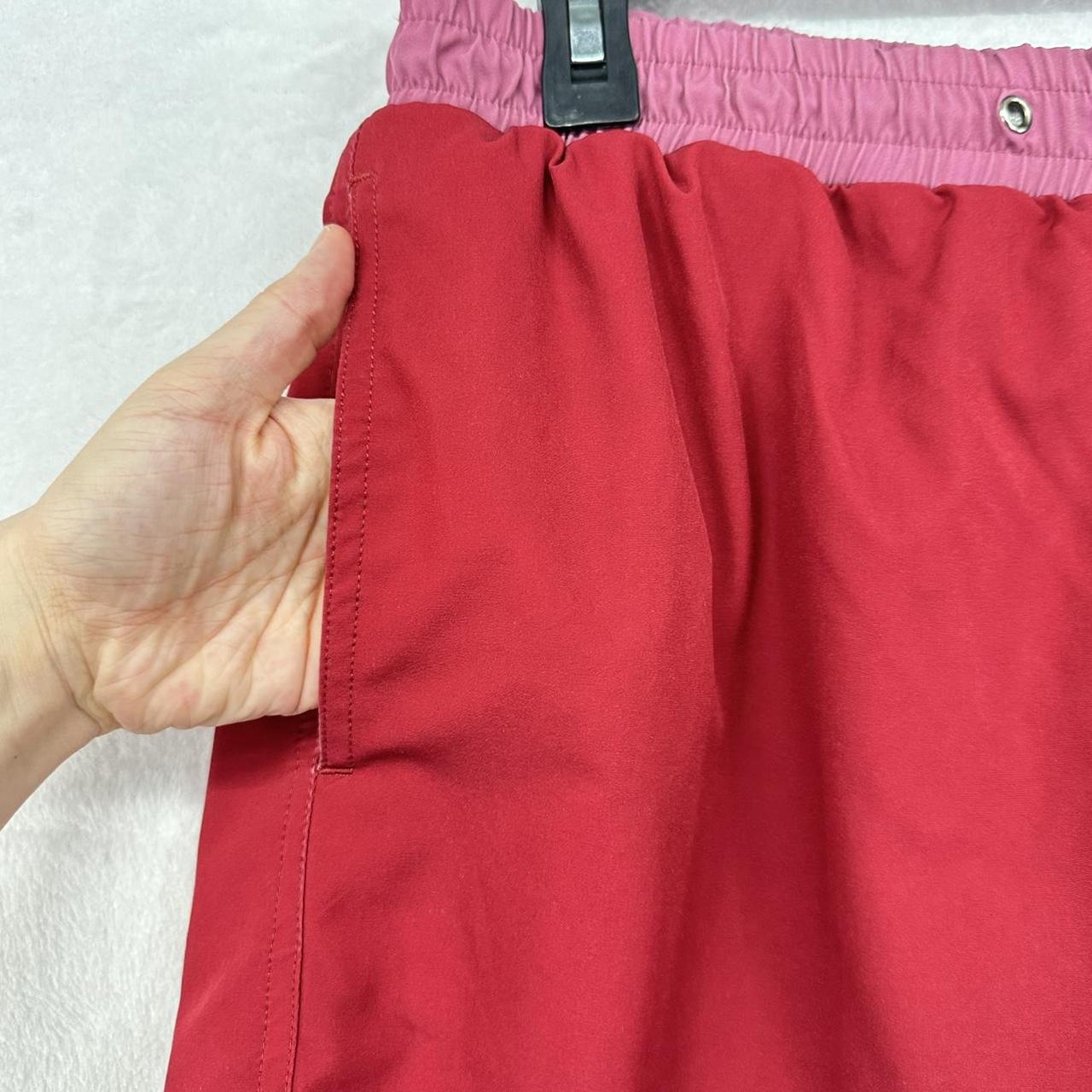 Red and pink slunks swim shorts. Features pockets,... - Depop