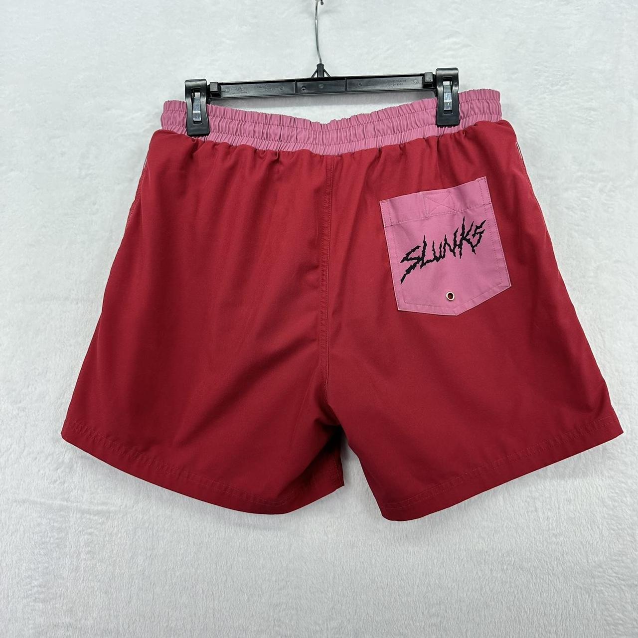 Red and pink slunks swim shorts. Features pockets,... - Depop