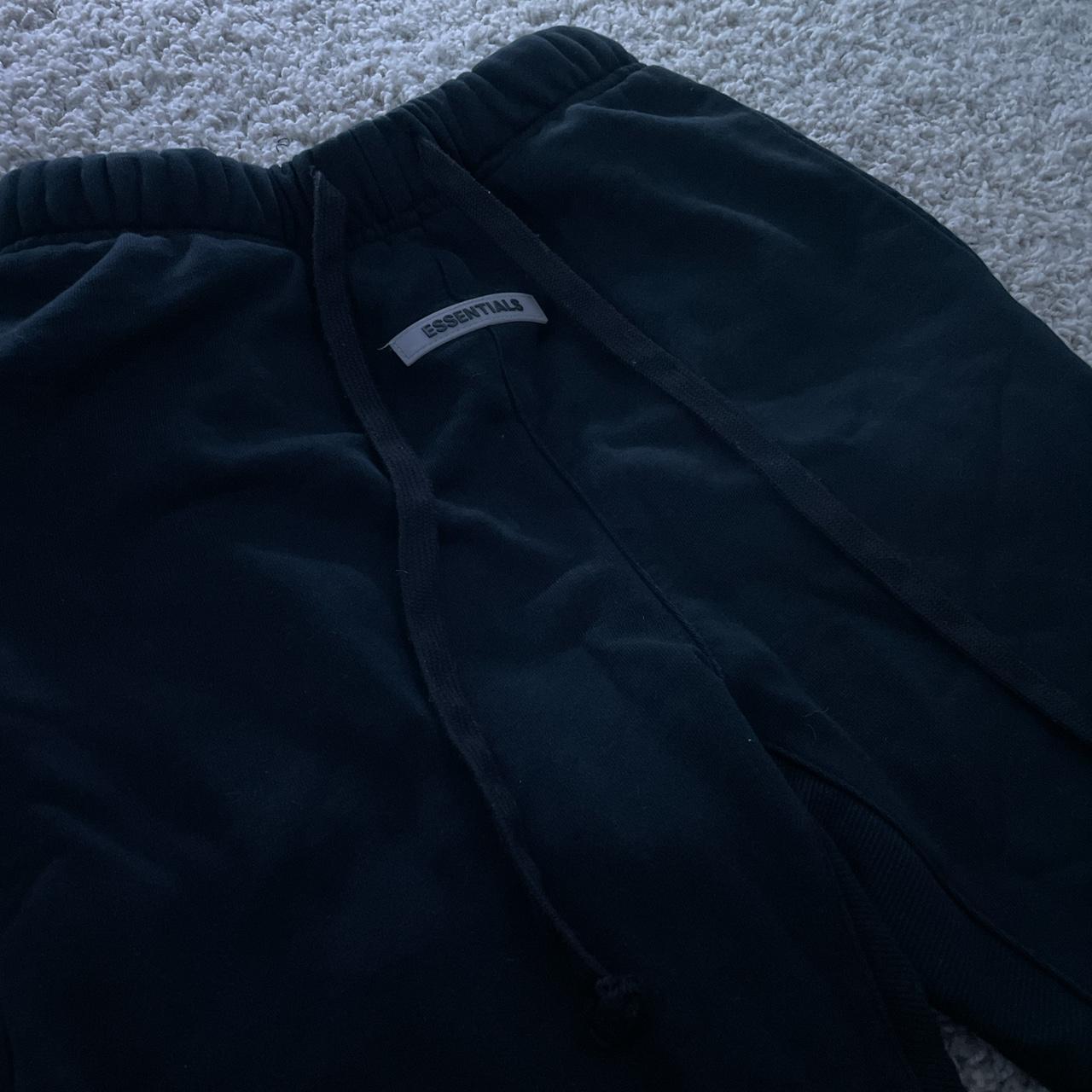 Uncuffed Black Fear of God Essentials sweatpants. Dm... | Depop